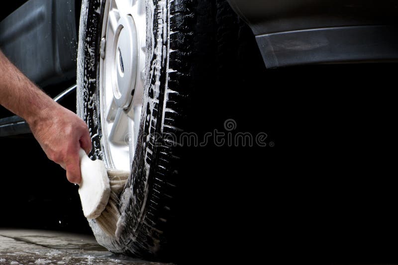 Cleaning Tire in a Car Wash Stock Image - Image of washing, automobile ...