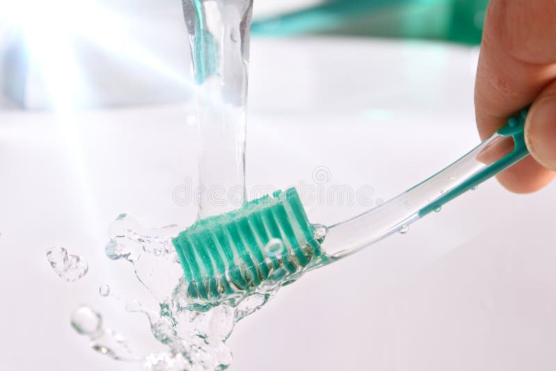 Daily Cleaning of the Toothbrush after Use in Sink Closeup Stock Image ...