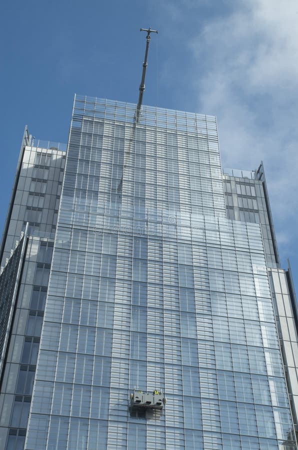 Cleaning the Windows of a Skyscraper with Cradle with Two People Stock ...
