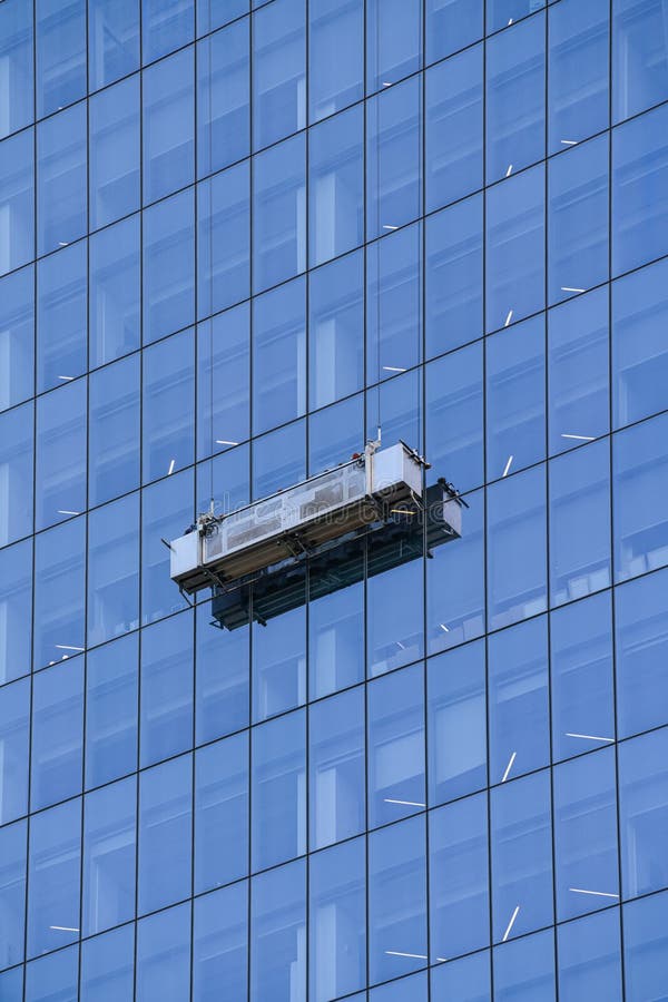 Cleaning the Windows of Some Tall Skyscraper Buildings. Workers are ...