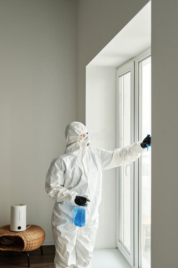 Cleaning Worker in Protective Suit Doing Housework Stock Photo - Image ...