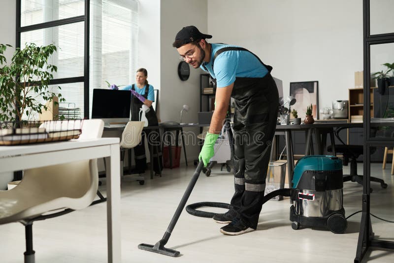 Cleaning Worker Vacuuming in Office Stock Photo - Image of teamwork ...