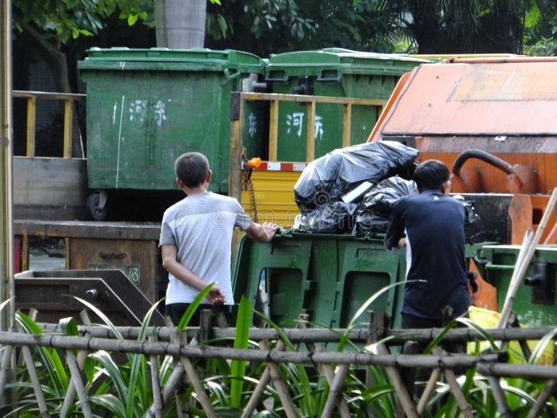 Cleaning Workers at the Garbage Transfer Station Editorial Image ...