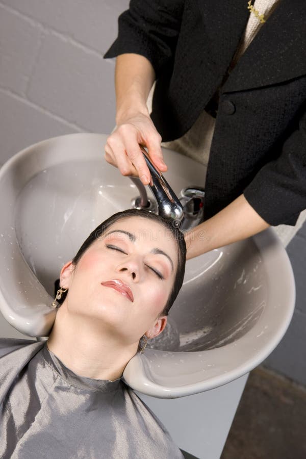 Beautiful Woman Relaxes Receiving Hair Cleansing Stock Image - Image of ...