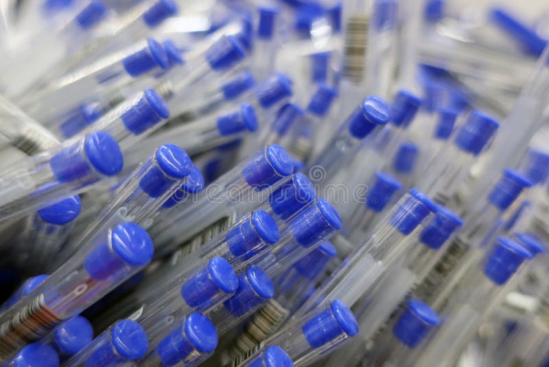 Clear Ballpoint Pens with Blue Caps Stock Photo - Image of economy ...