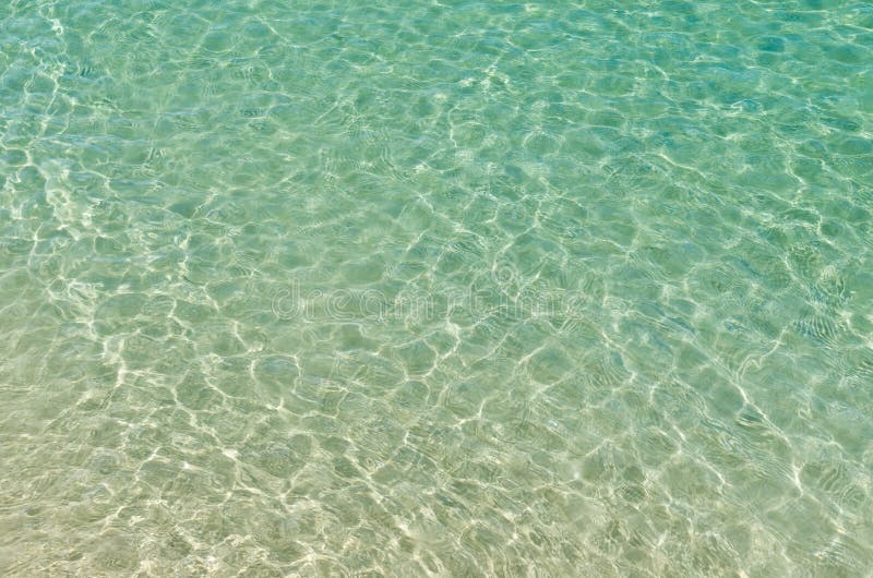 Clear Beach Ripple Water Reflecting in the Sun Stock Image - Image of ...