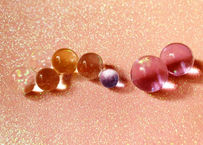 Clear Beautiful Marbles on the Sparking Plate Stock Photo - Image of ...