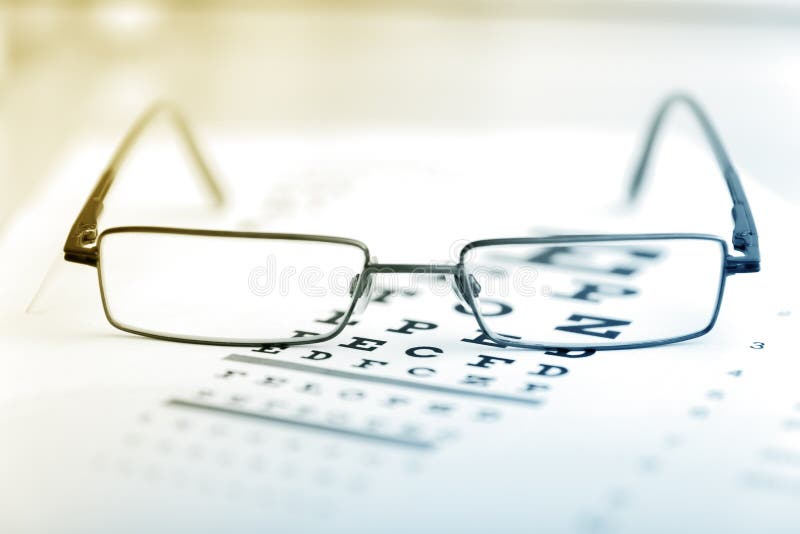 Eyeglasses on eye chart stock image. Image of test, isolated - 31806905