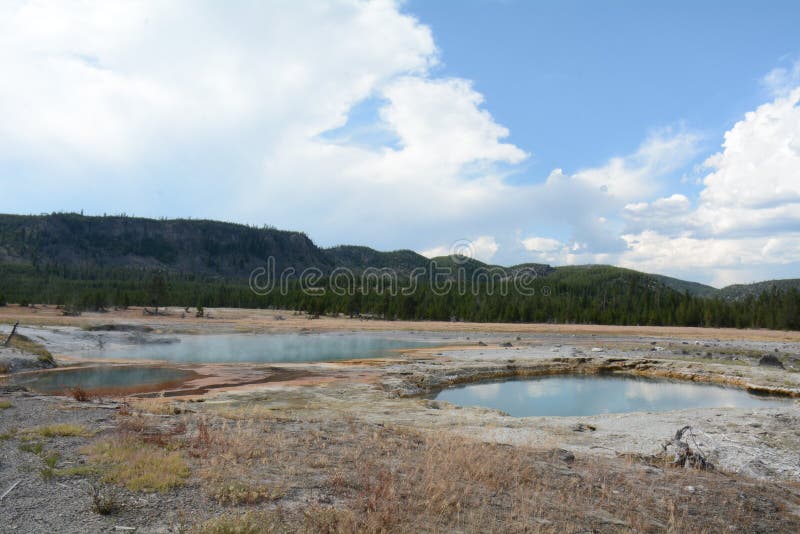 Clear Blue Hot Spring in Yellowstone National Park Stock Image - Image ...