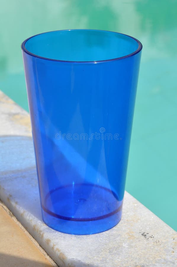 Clear blue plastic cup stock image. Image of clear, pool - 56018479