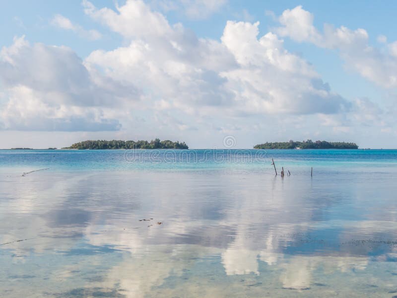 Clear Blue Sea and Sky Reflection Stock Image - Image of clear, beach ...