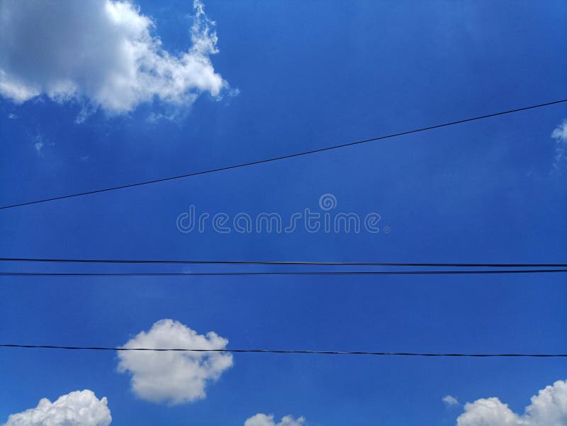 Clear Blue Sky with Electrical Wire Across the Sky Stock Image - Image ...