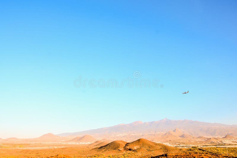 A Clear Blue Sky with a Mountain Range in the Background Stock Image ...