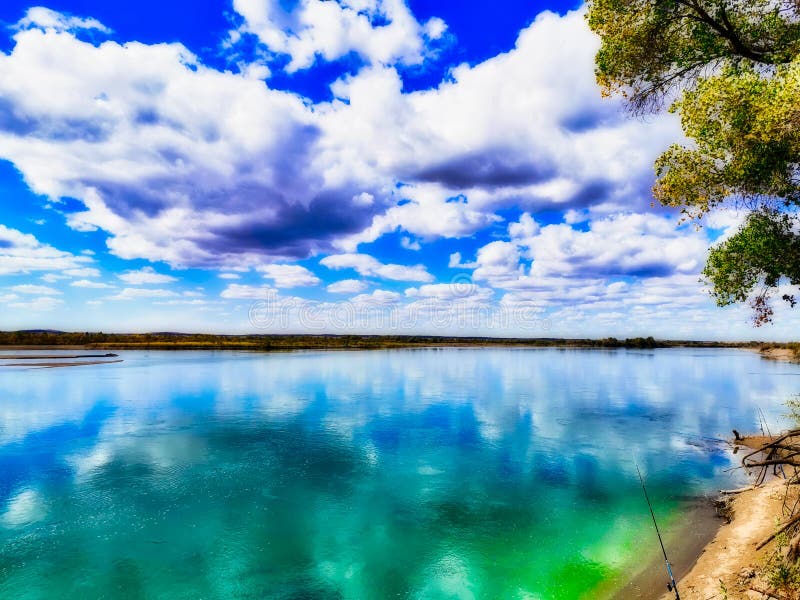 Clear Blue Sky Over the River Stock Photo - Image of water, tree: 214906484