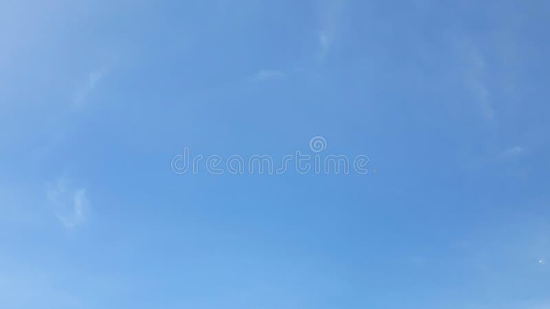 Clear Blue Sky with Subtle Clouds on a Sunny Day Stock Photo - Image of ...