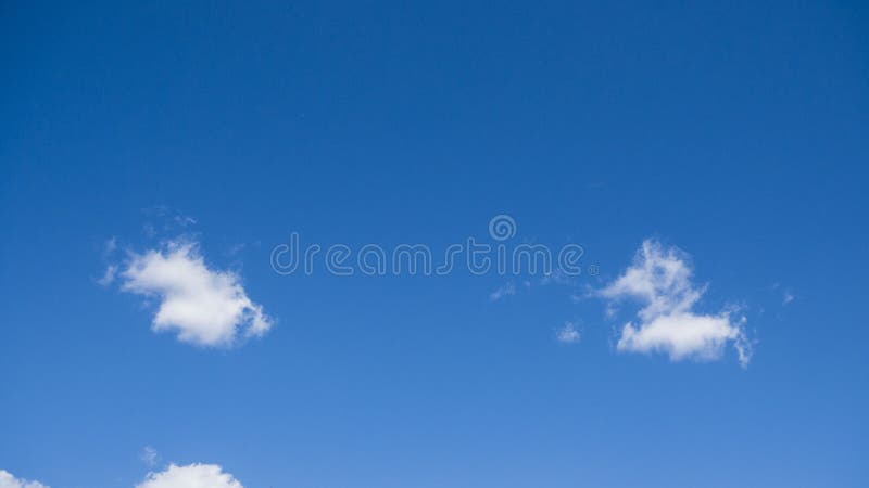 Clear Blue Sky with White Clouds on a Clear Day Stock Photo - Image of ...