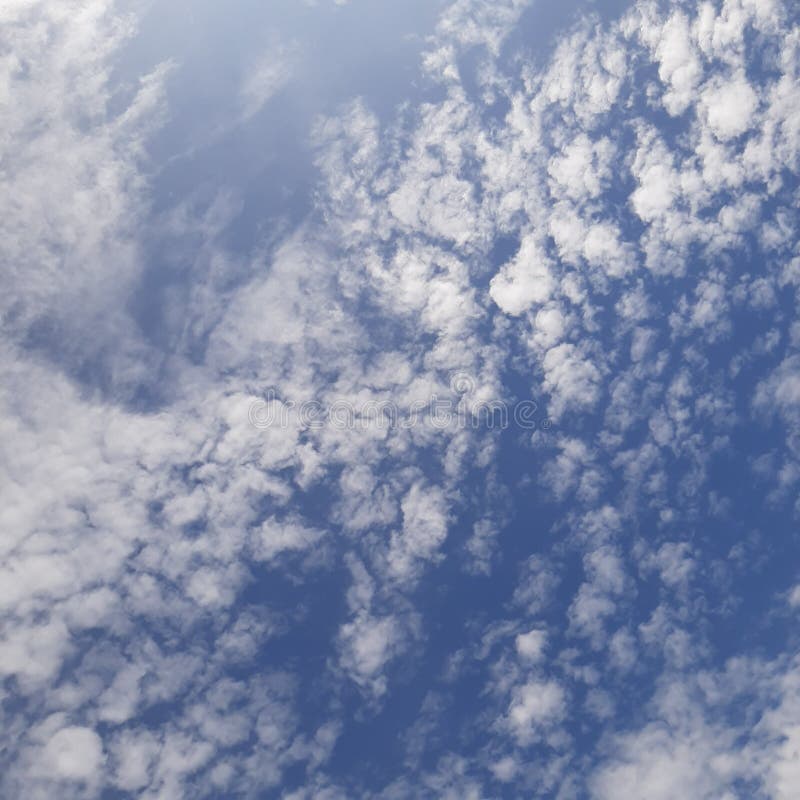 Clear Blue Sky with White Little Clouds Around Stock Image - Image of ...