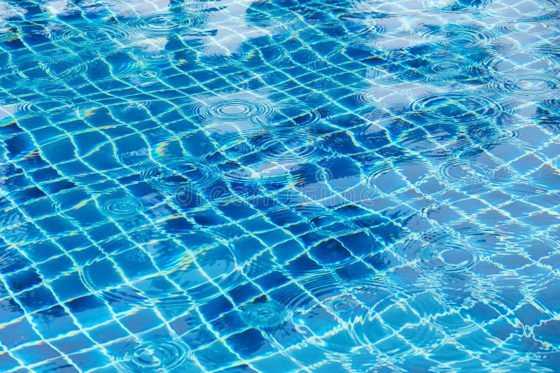 Clear Blue Water Surface with Ripples in Swimming Pool, Creating ...