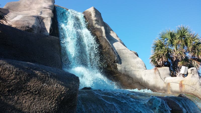 A Clear Blue Waterfall on a Miniature Golf Course Stock Photo - Image ...