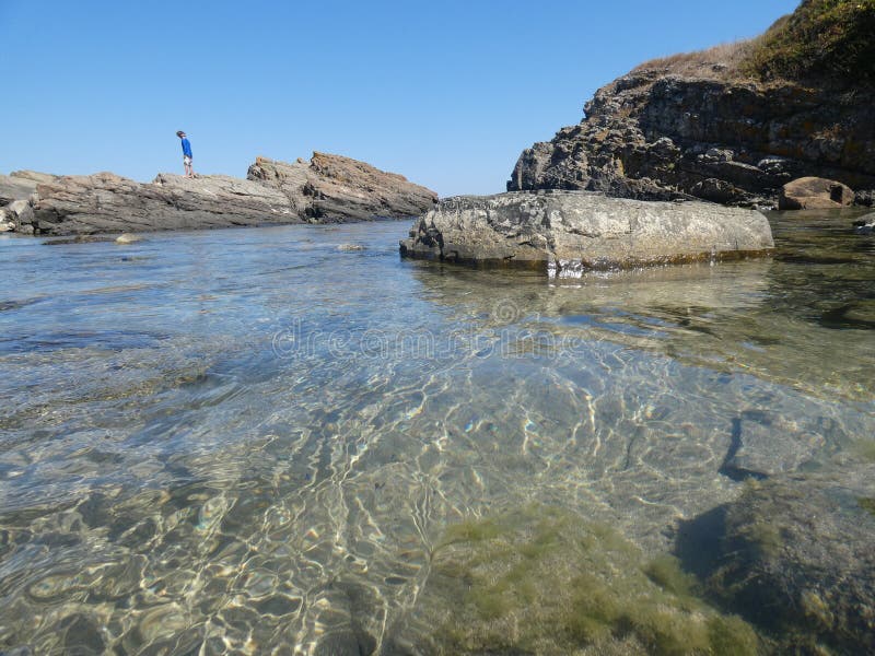 Clear Calm Sea Water with Sunlight and Sea Rocks. Summer Time Landscape ...