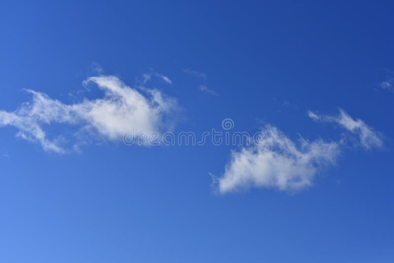 Clear Deep Blue Sky with Fluffy Clouds. Stock Photo - Image of ...