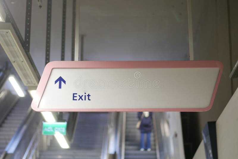 Directional Exit Sign Prominently Displayed in a Modern Transit Station ...