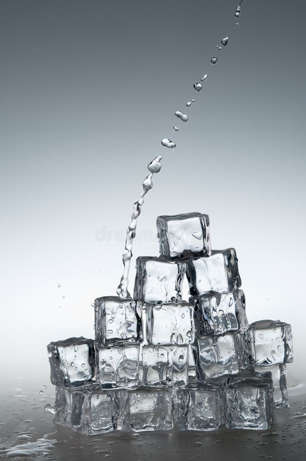 Ice cubes on water stock image. Image of splash, solid - 4572155