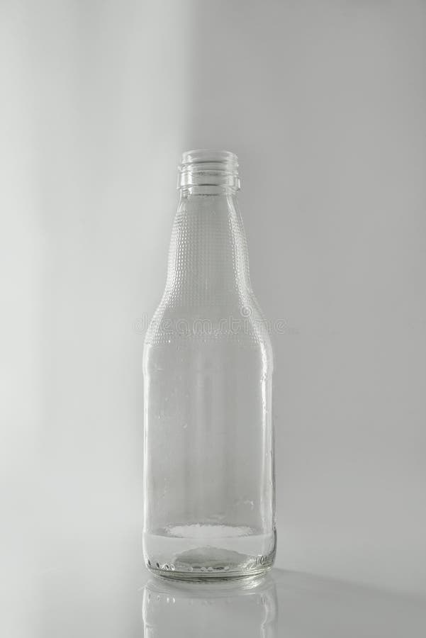 Clear Glass Bottle on White Background Stock Photo - Image of ...