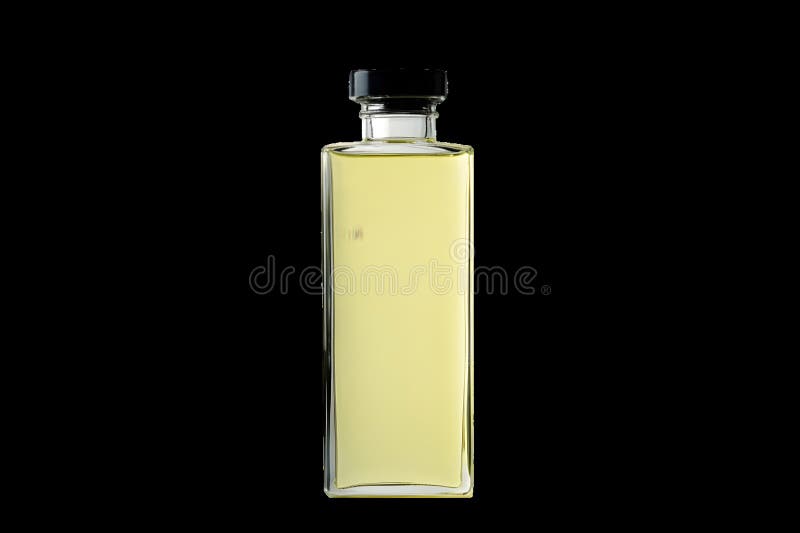 Clear Glass Bottle with Yellow Liquid and Black Cap Stock Image - Image ...
