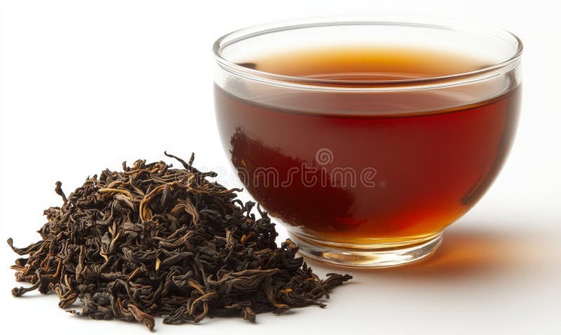 In a Clear Glass Cup, Reddish Brown Tea is Photographed on a White ...