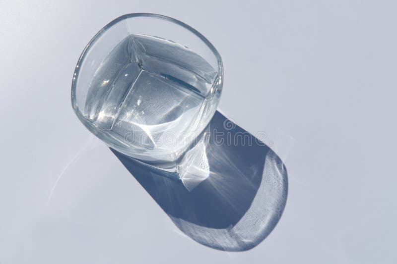 A Clear Glass Filled with Water with Shadow Stock Image - Image of ...
