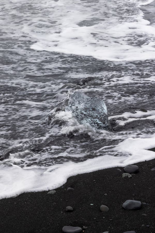 Clear Iceberg in Diamond Beach in Iceland Stock Image - Image of ...