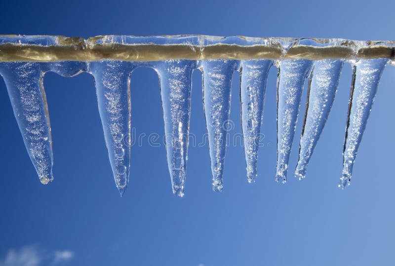 Clear Ice Icicles Hang on a Clear Day Stock Image - Image of natural ...