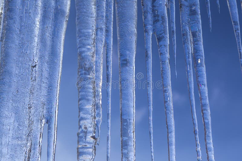 Clear Icicles Against Blue Sky. Stock Photo - Image of icicle, nature ...
