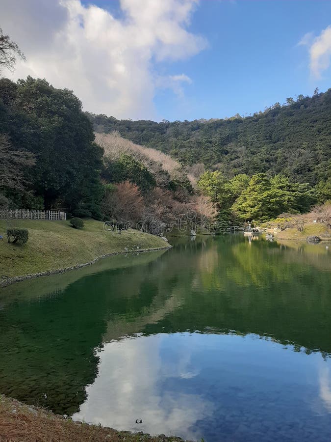 Clear Lake Down the Hill in Autumn Stock Photo - Image of autumn, rock ...