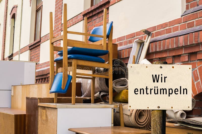 We Clear Out Sign in German Stock Photo - Image of renovation, garbage ...