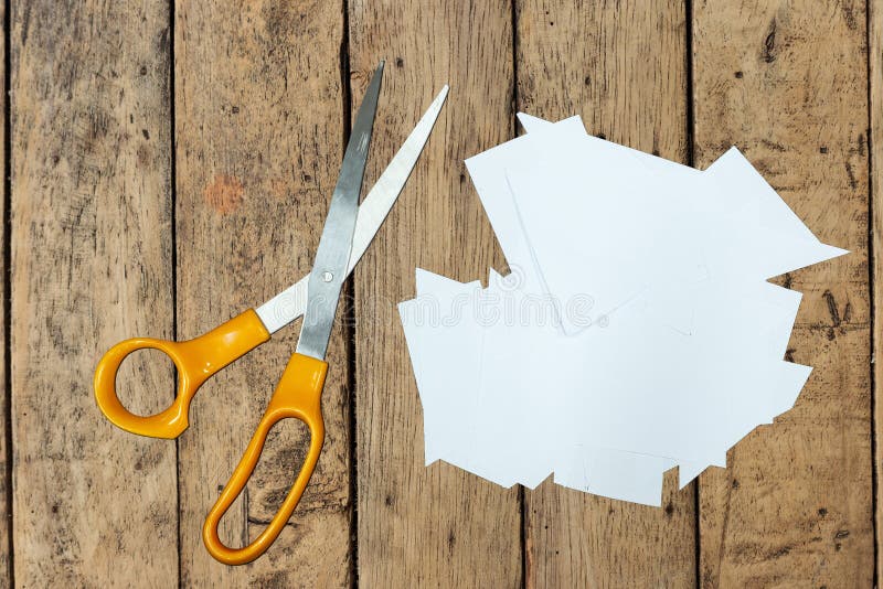 Clear Paper Cutting and Scissors on Wood Table Stock Photo - Image of ...