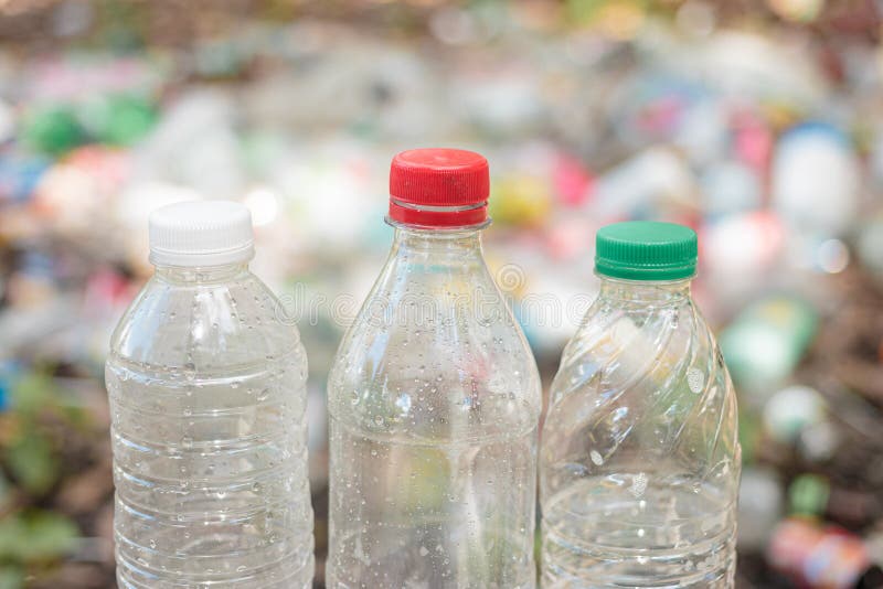 Clear Plastic Bottles of Many Sizes in Plastic Buckets. Stock Photo ...