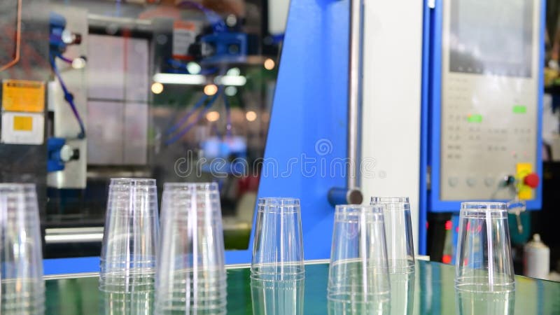 Clear Plastic Cup Transfer on Automated Conveyor Systems Industrial ...