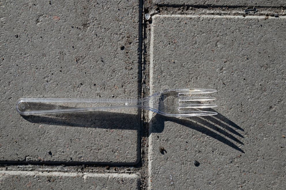 Clear Plastic Fork on Ground Stock Image - Image of outdoor, rubbish ...
