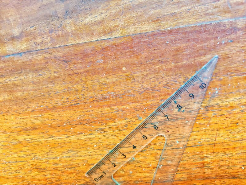 Clear Plastic Ruler on a Wooden Table Stock Image - Image of measuring ...
