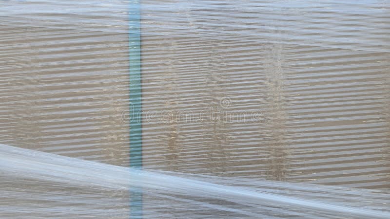 Clear Plastic Wraps Brown Cardboard Box. Stock Photo - Image of ...