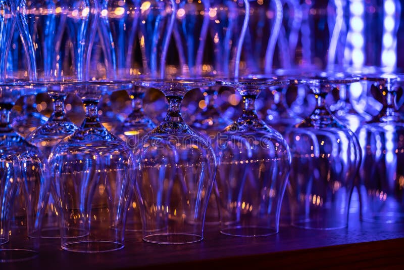 Clear Rum Glasses in the Night Bar Glowing with Neon Colors Stock Image ...