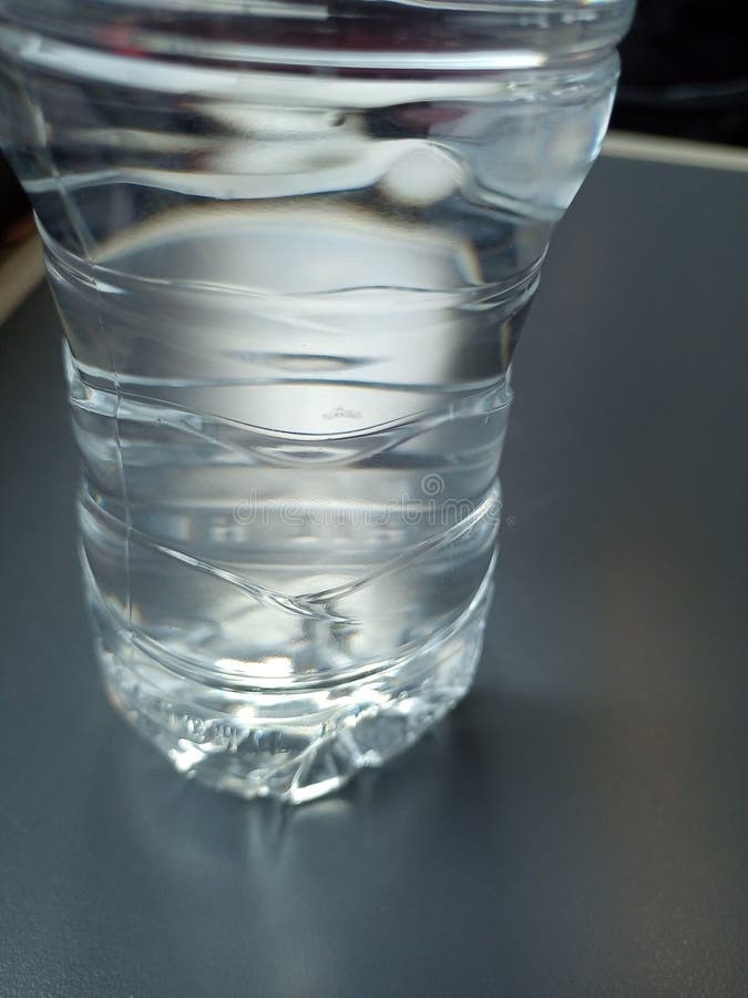 Clear See through Water Bottle Train Table Stock Photo - Image of ...