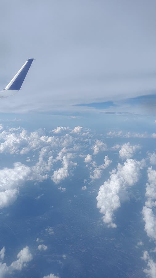 The Clear Sky is Sea Blue and the Thin Clouds are Pure White Like Snow ...