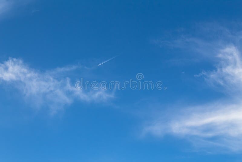 Clear Sky with Small Airplane in the Distance Stock Photo - Image of ...