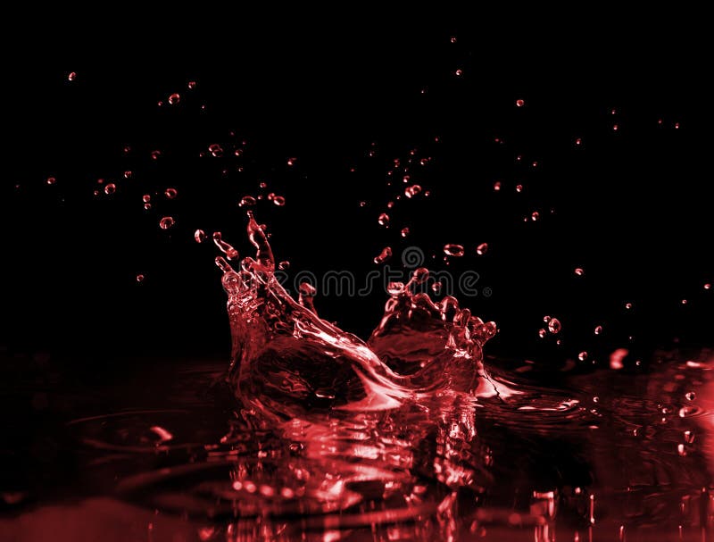 Red splash on a black stock photo. Image of abstract - 107619678