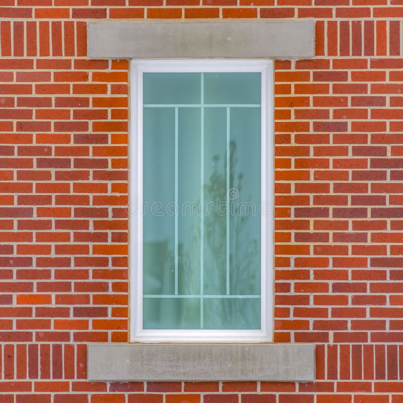 Clear Square Close Up of the Rectangular Window of a Building with Red ...