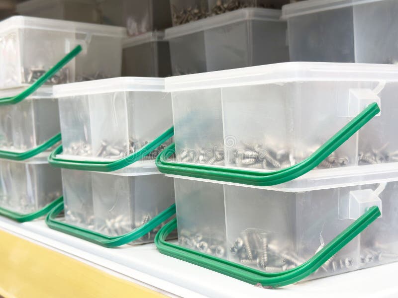 Clear Storage Bins with Metal Screws in Hardware Store Stock Photo ...