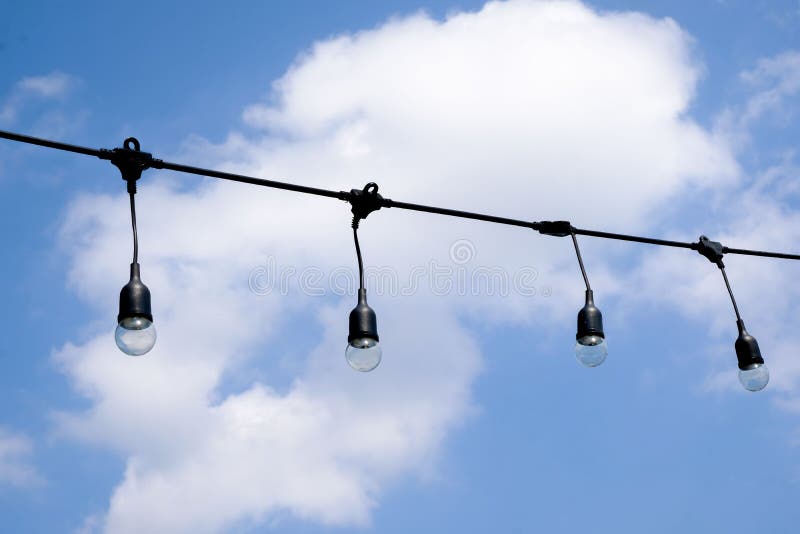 Clear String Lights on Blue Sky Background Stock Photo - Image of light ...